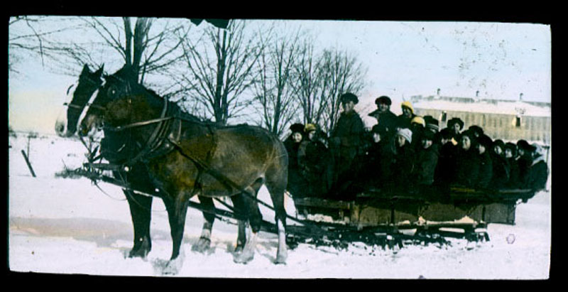 [Children riding a horse drawn sleigh, Mount Elgin Residential School ...